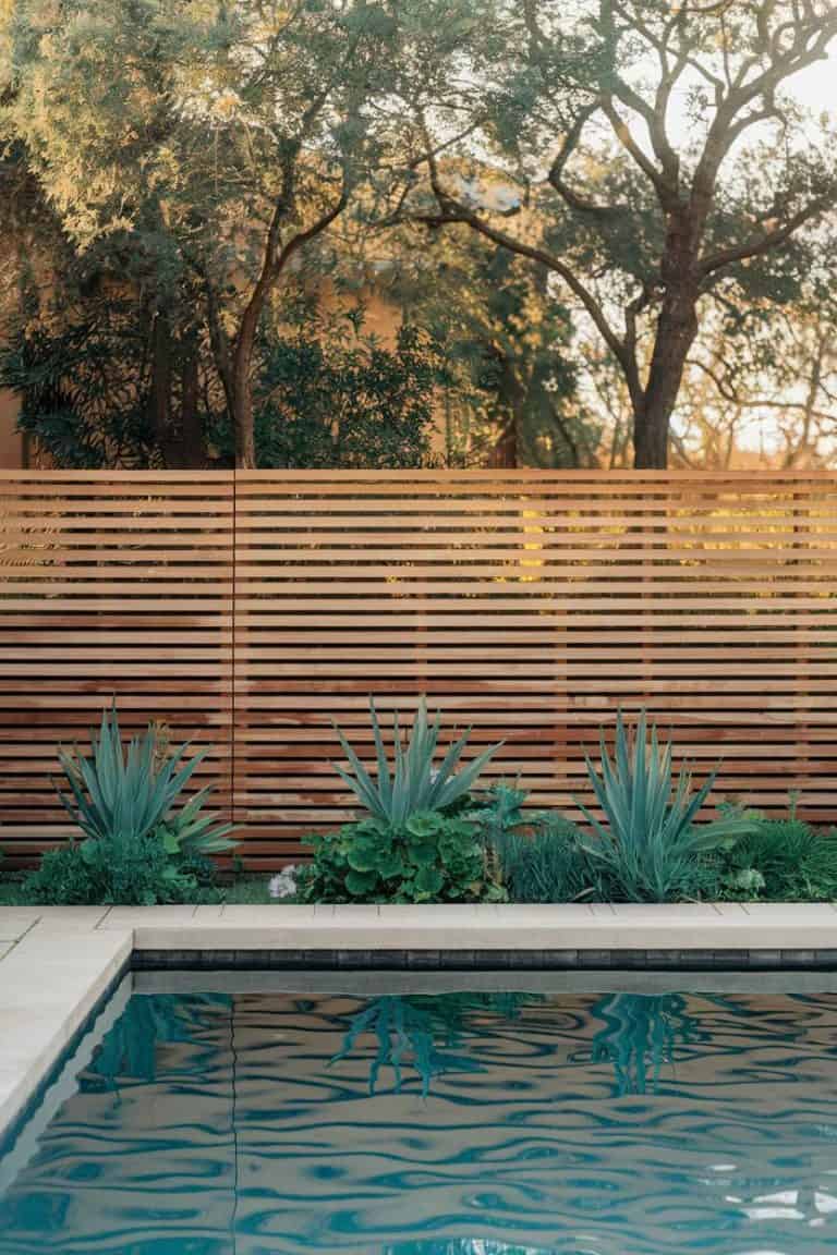 35 Pool Fence Ideas for a Safe, Stunning, and Functional Barrier