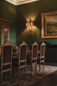 24 Moody Dining Room Ideas To Create an Elegant, Dramatic Ambiance